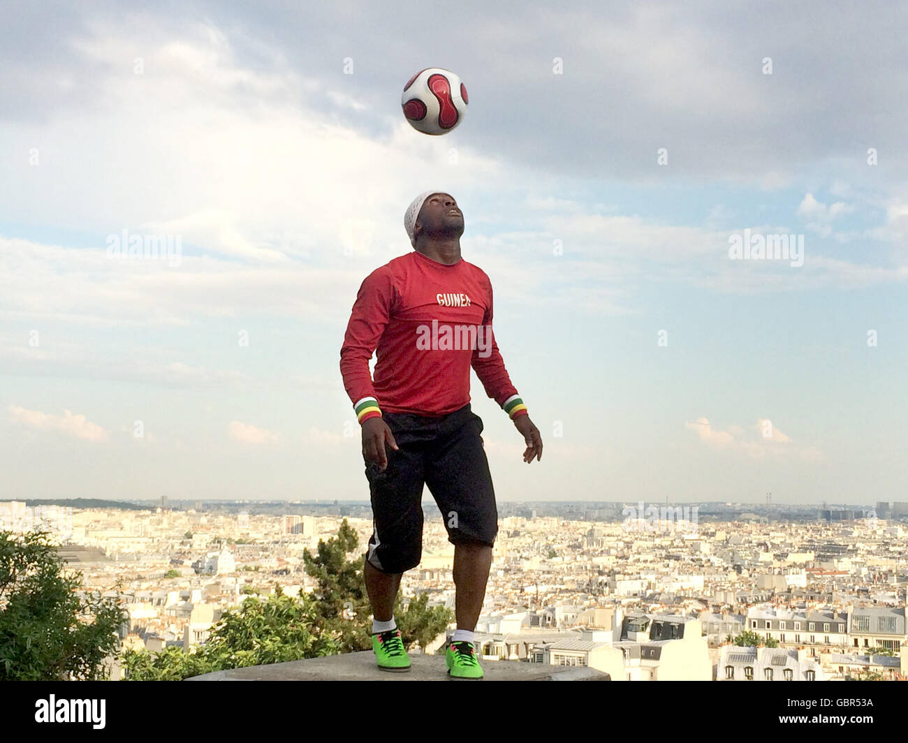 Paris, France. 23rd June, 2016. Soccer artist Iya Traore balances with ...