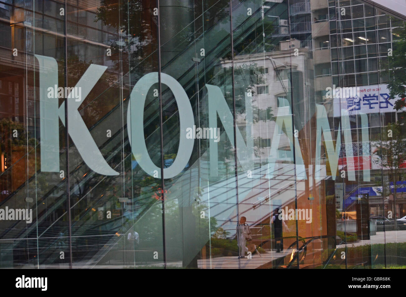 Tokyo, Japan. 8th July, 2016. A glass window at KONAMI HOLDINGS ...
