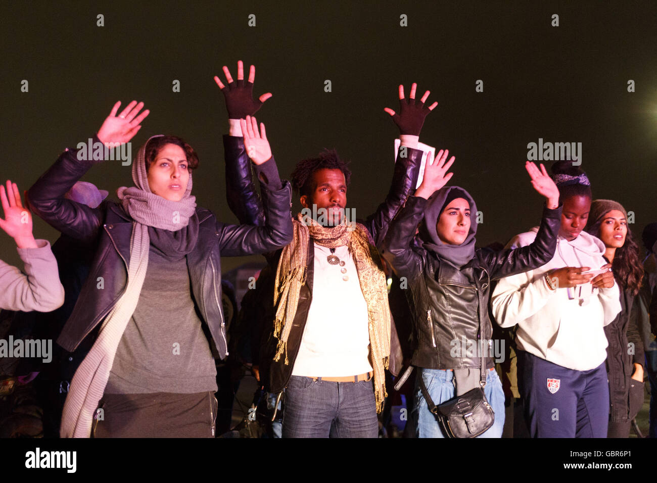 Oakland, California, USA. 7th July, 2016. Demonstrators raise their ...