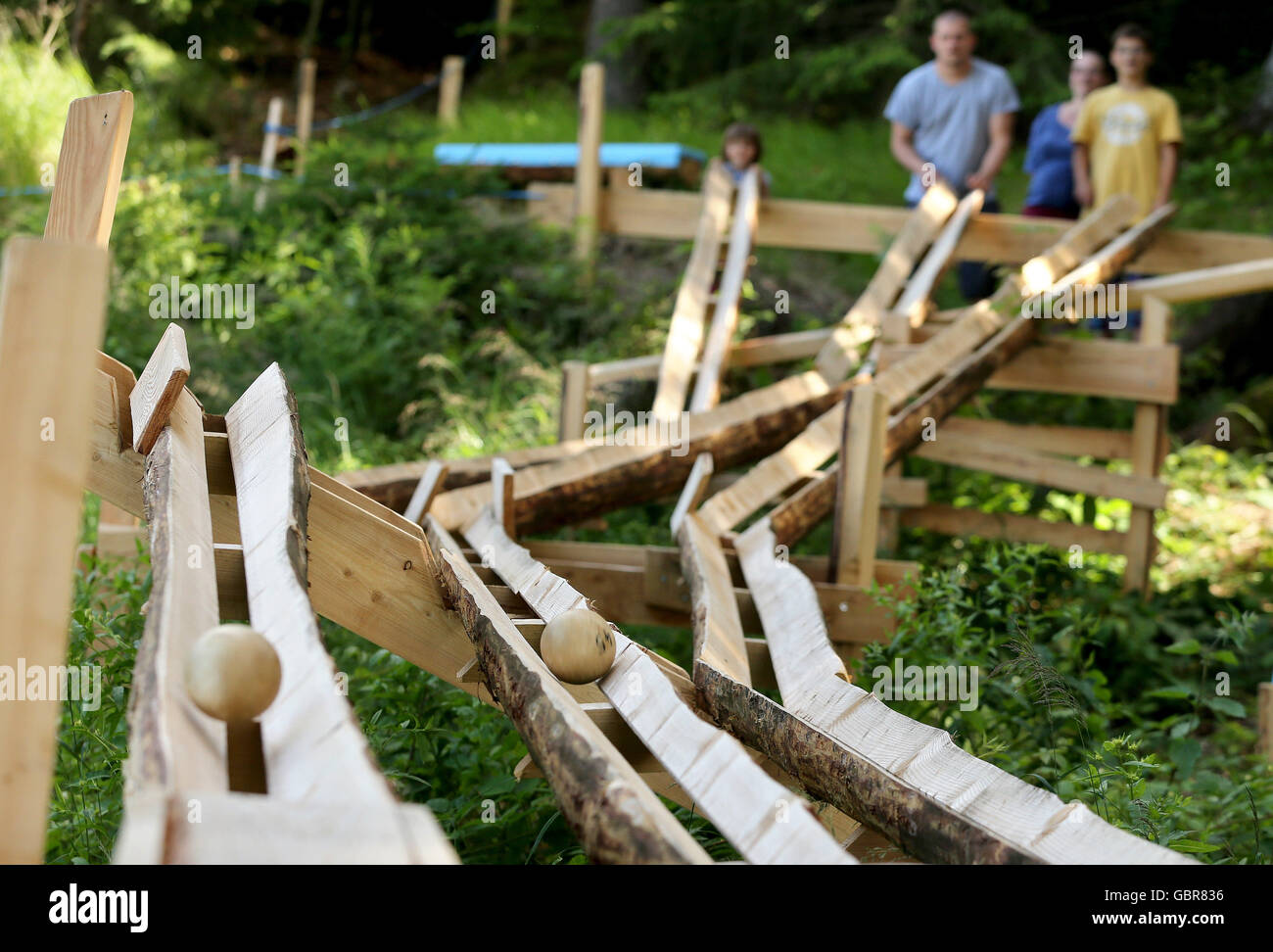 A family playing with the marble run in Eibenstock, Germany, 7 July ...