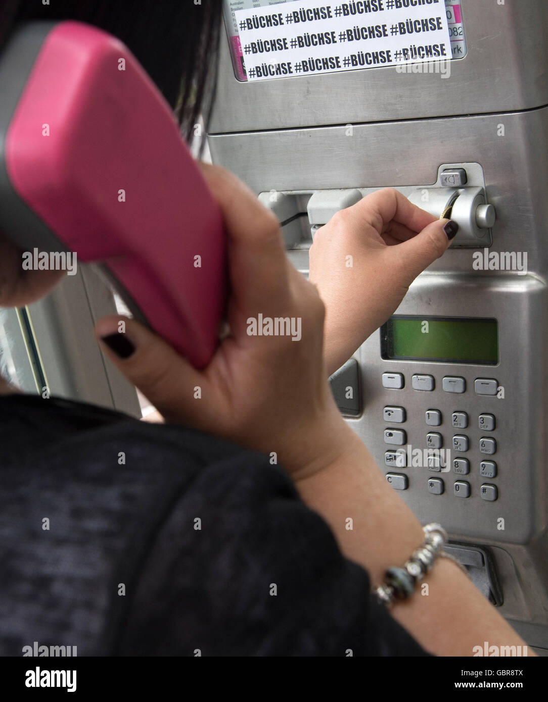 Using A Payphone High Resolution Stock Photography and Images - Alamy