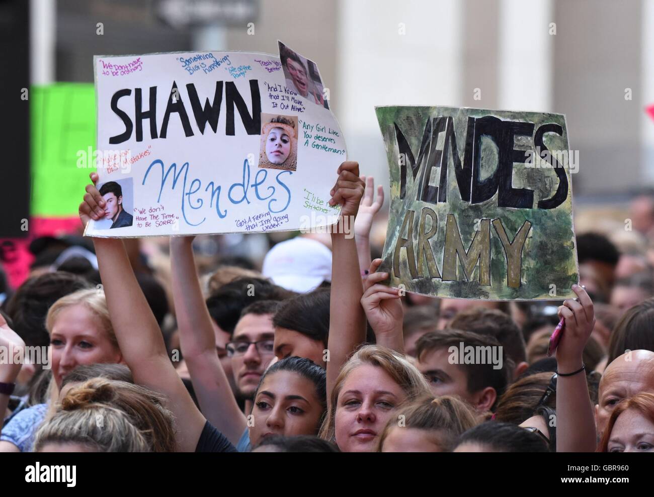 New York, NY, USA. 8th July, 2016. Shawn Mendes fan signs on stage for ...