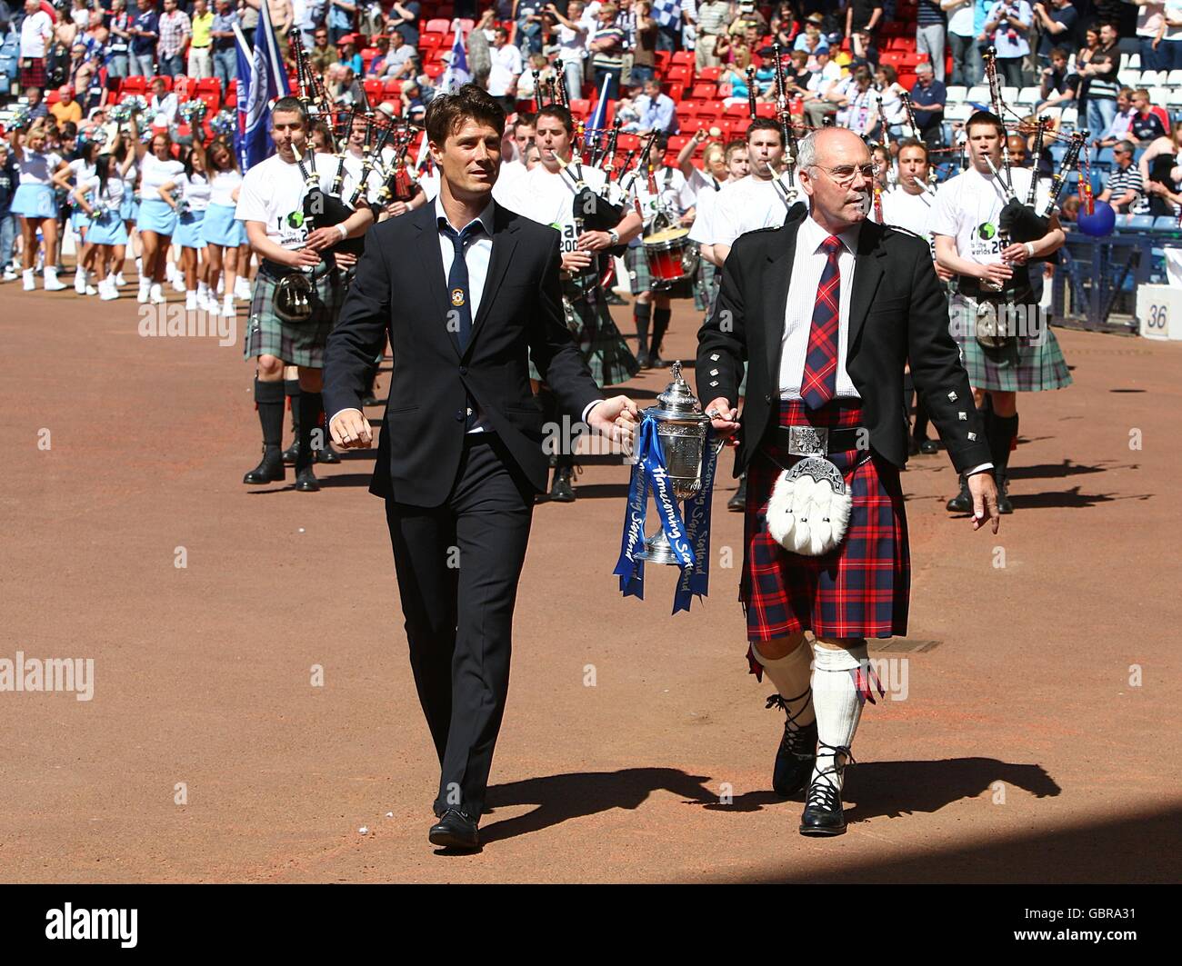 Former Rangers player Brian Laudrup (left) and former Falkirk player an ...