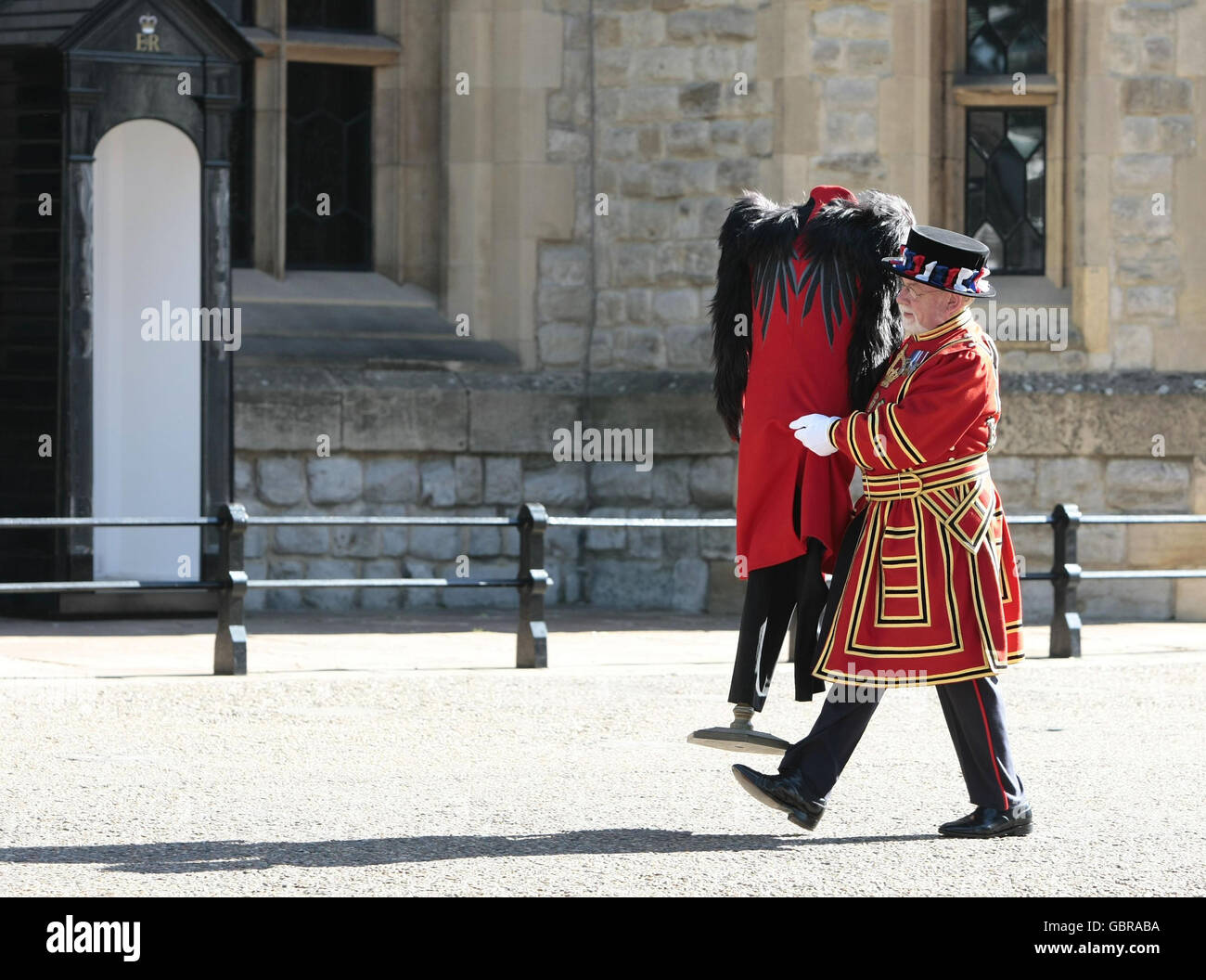 Tower of London Yeoman Sergeant Phil Wilson carries one of the new ...