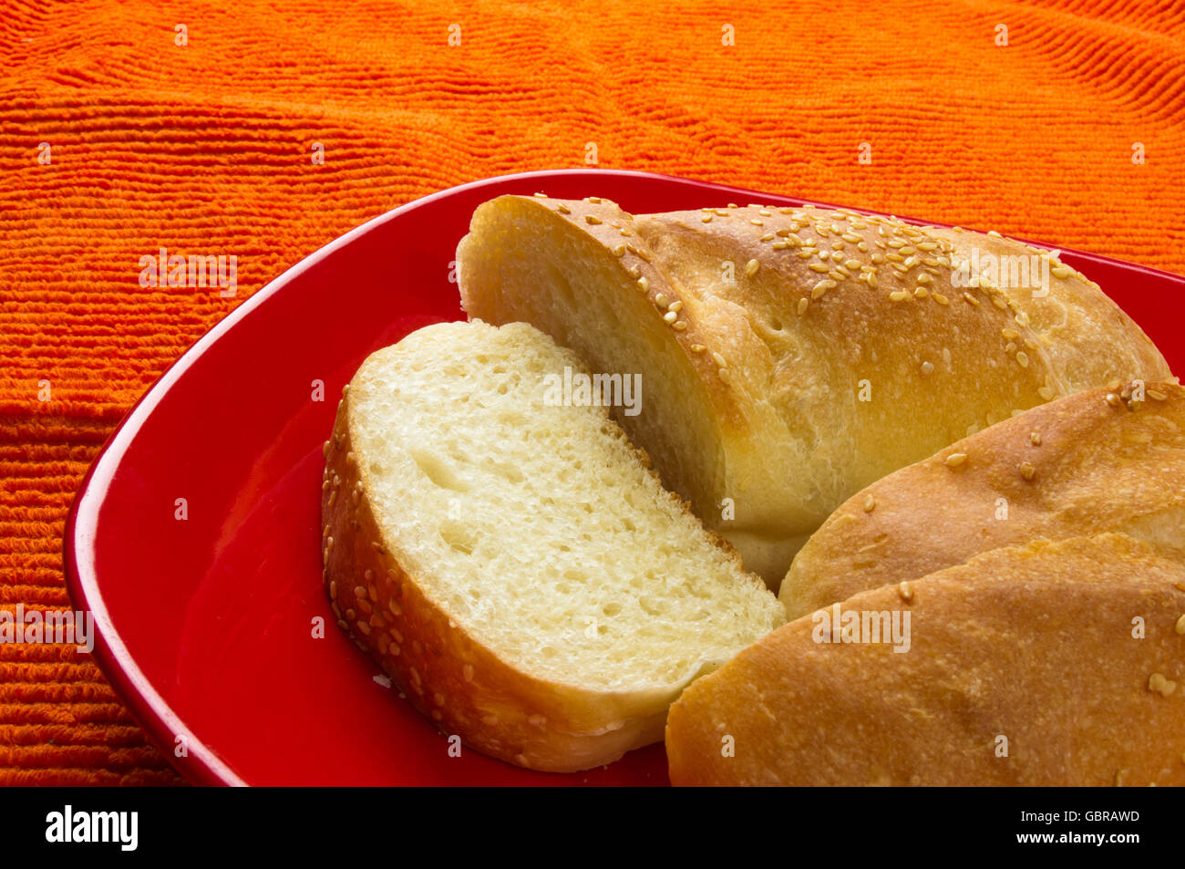 sliced whole wheat breads on a red plate Stock Photo - Alamy
