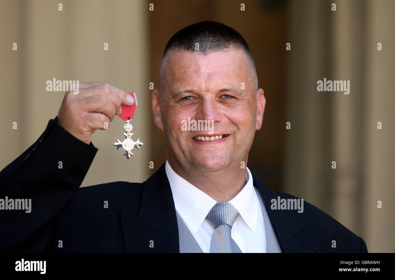 Tube driver David Matthews with the MBE he received earlier from Queen ...
