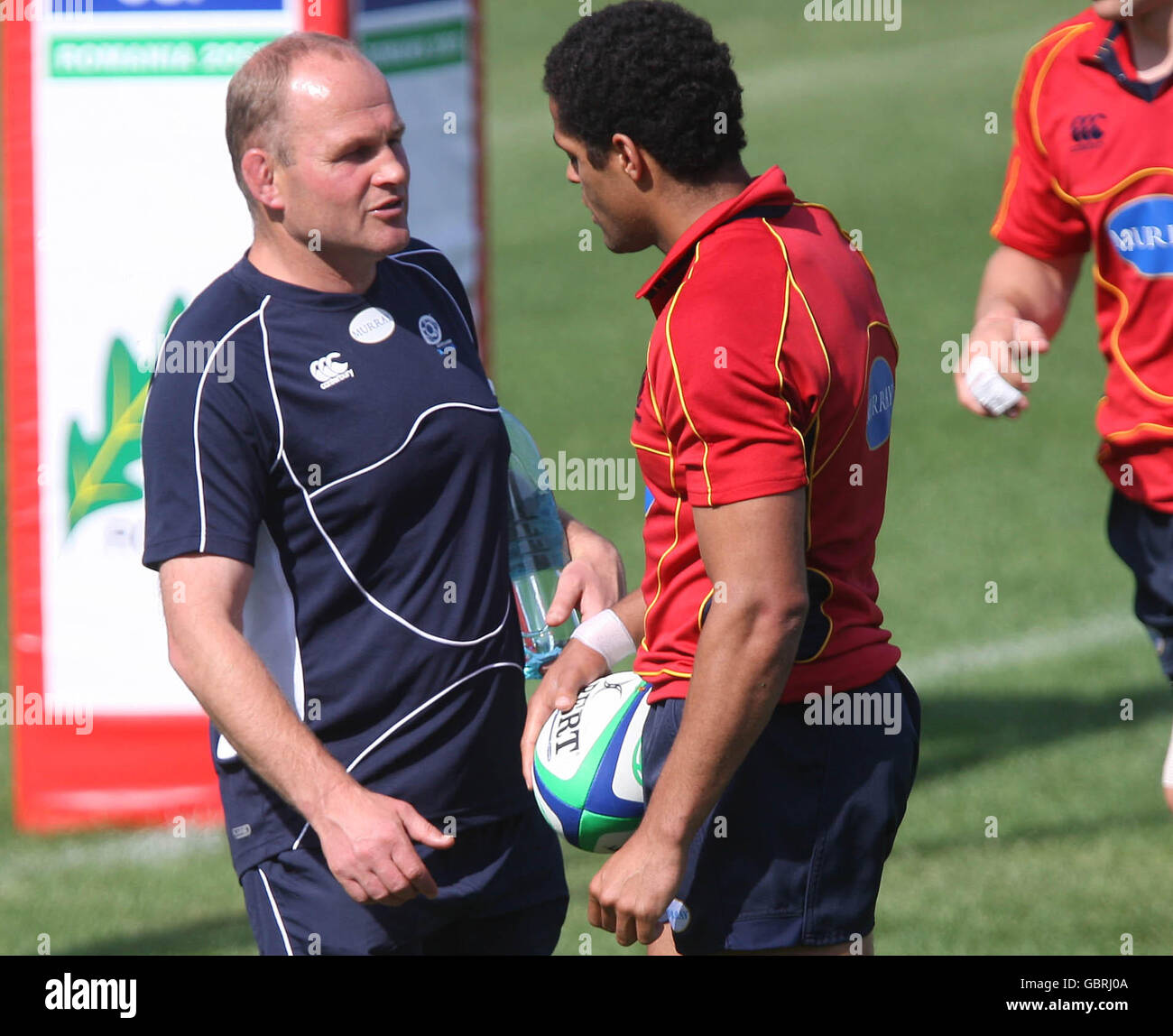 Scotland 'A's Head Coach Andy Robinson talks to Joe Ansbro during a ...