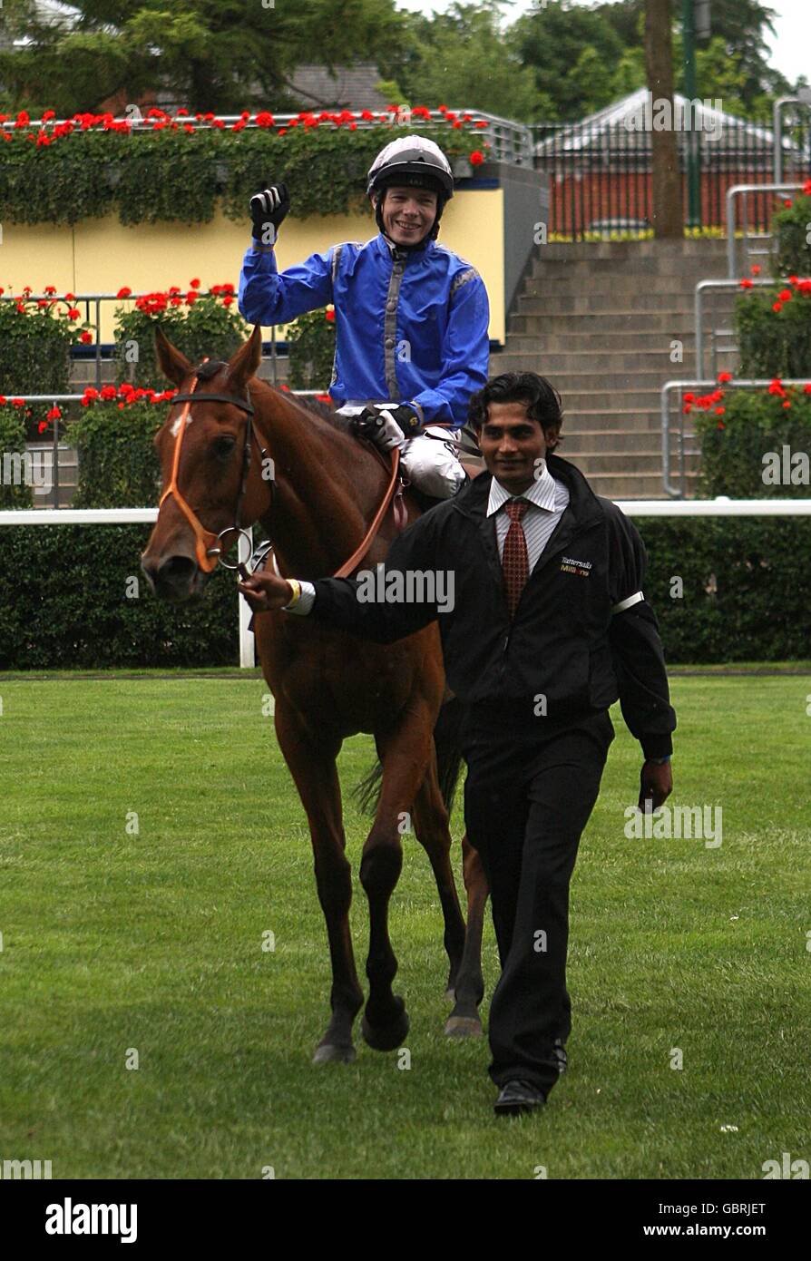 Jockey Jamie Spencer celebrates winning the Sandringham Hanidcap on ...