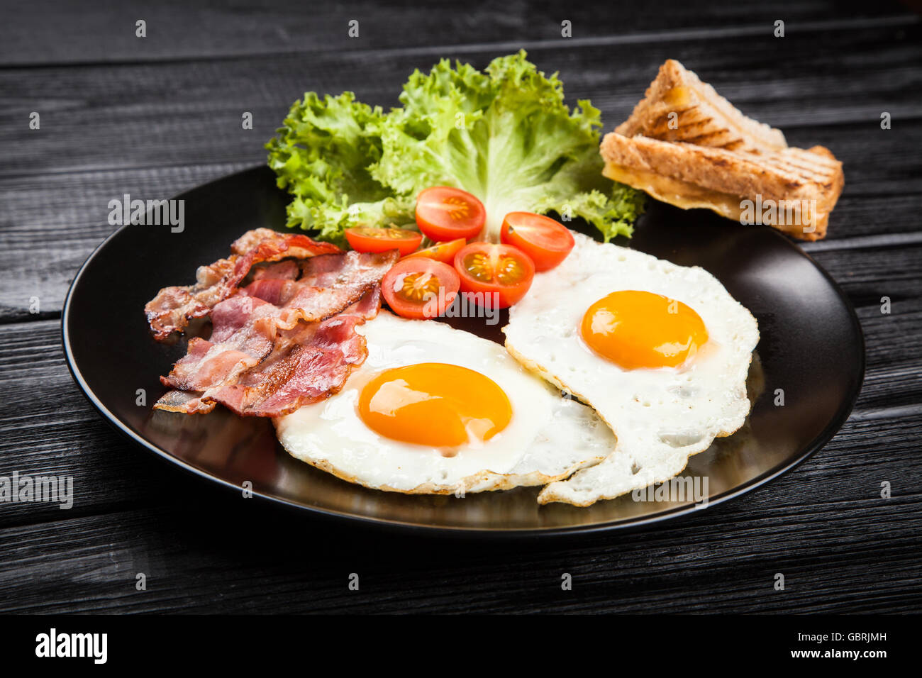 Traditional breakfast on a plate Stock Photo - Alamy