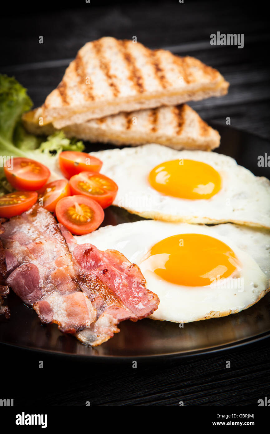 Traditional breakfast on a plate Stock Photo - Alamy