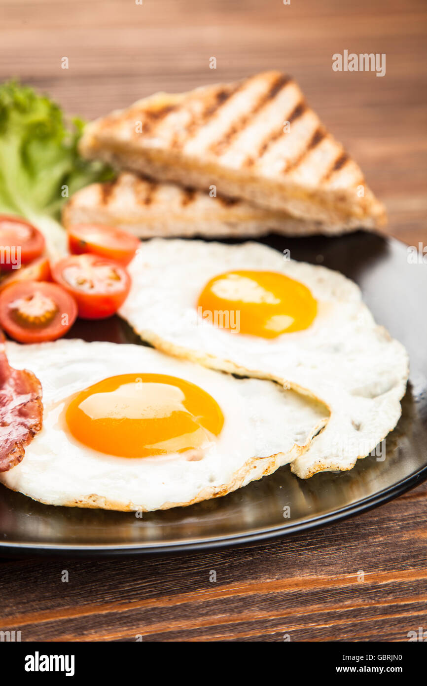 Traditional breakfast on a plate Stock Photo - Alamy
