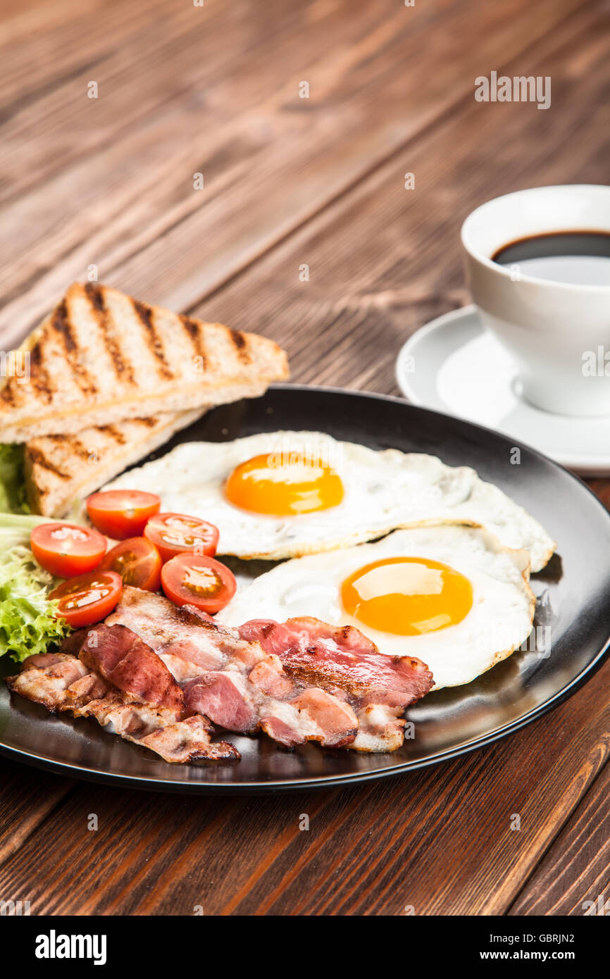Traditional breakfast on a plate Stock Photo - Alamy