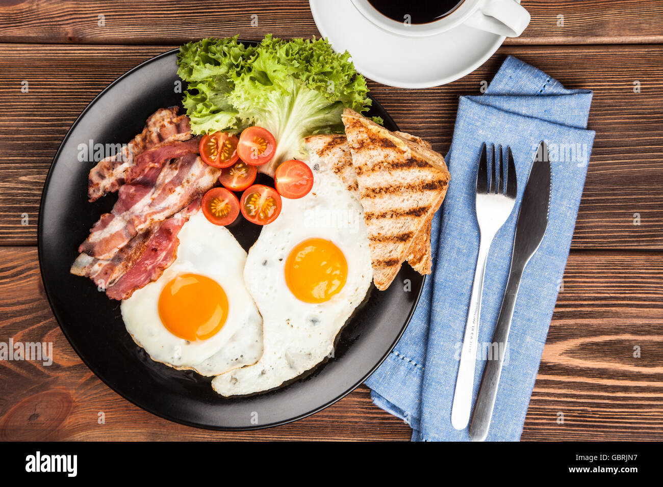 Traditional breakfast on a plate Stock Photo - Alamy