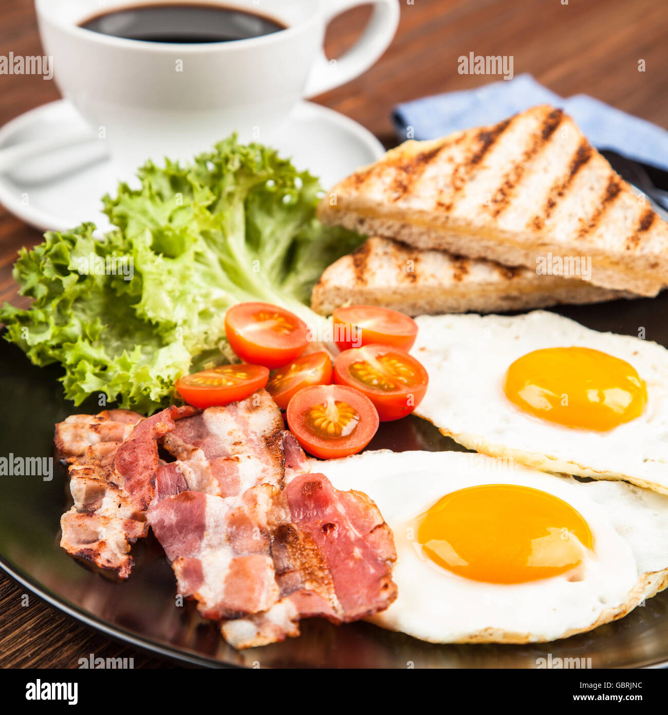 Traditional breakfast on a plate Stock Photo - Alamy