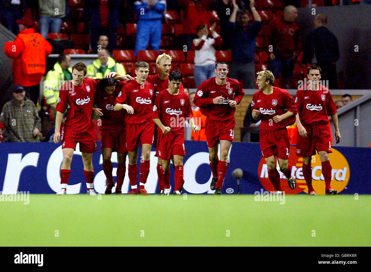 Liverpool's Milan Baros (2nd l) is congratulated by his teammates after ...
