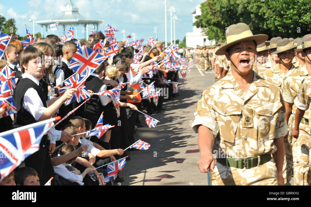 Group of people waving union jack flags hi-res stock photography and ...