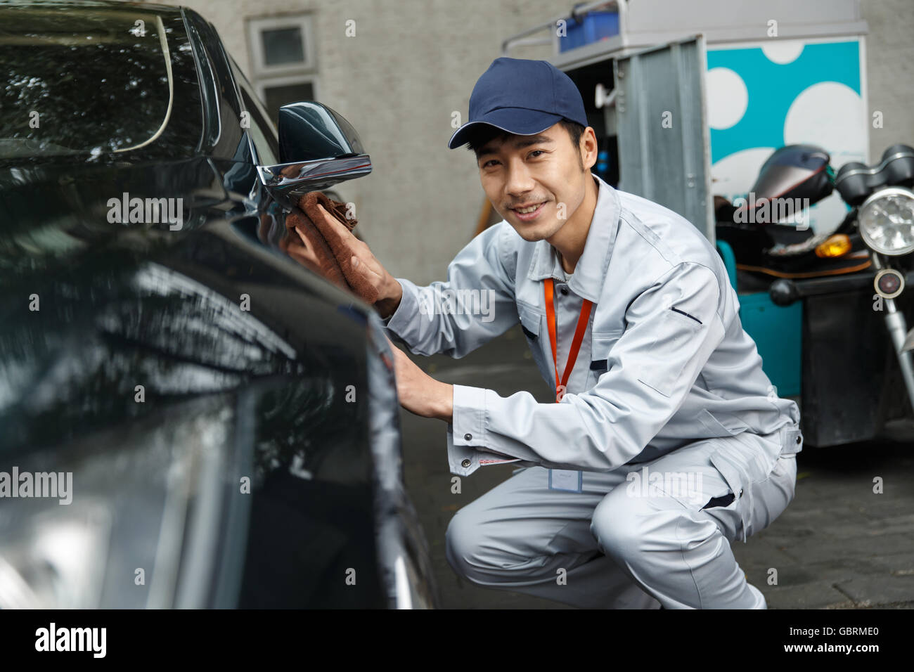 The young man was cleaning the car Stock Photo - Alamy