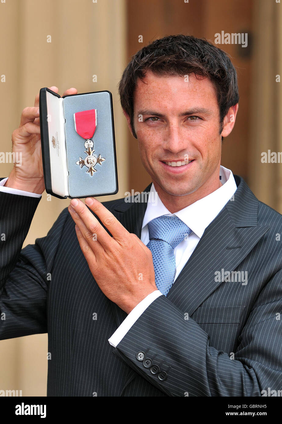 Olympic Gold medallist rower Mark Hunter with his MBE after it was ...