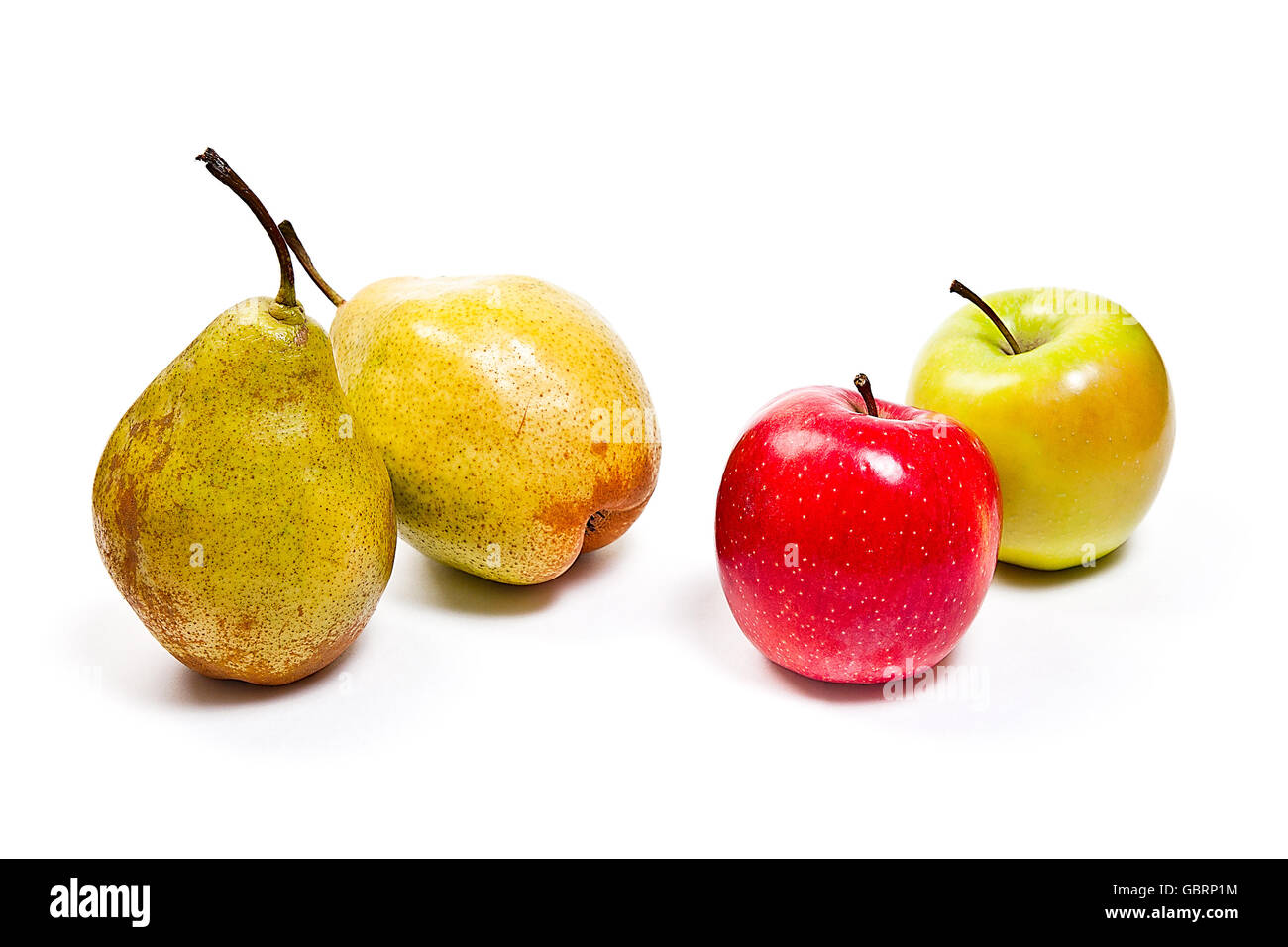 Two fresh green pears and two apples in red and green color. With ...