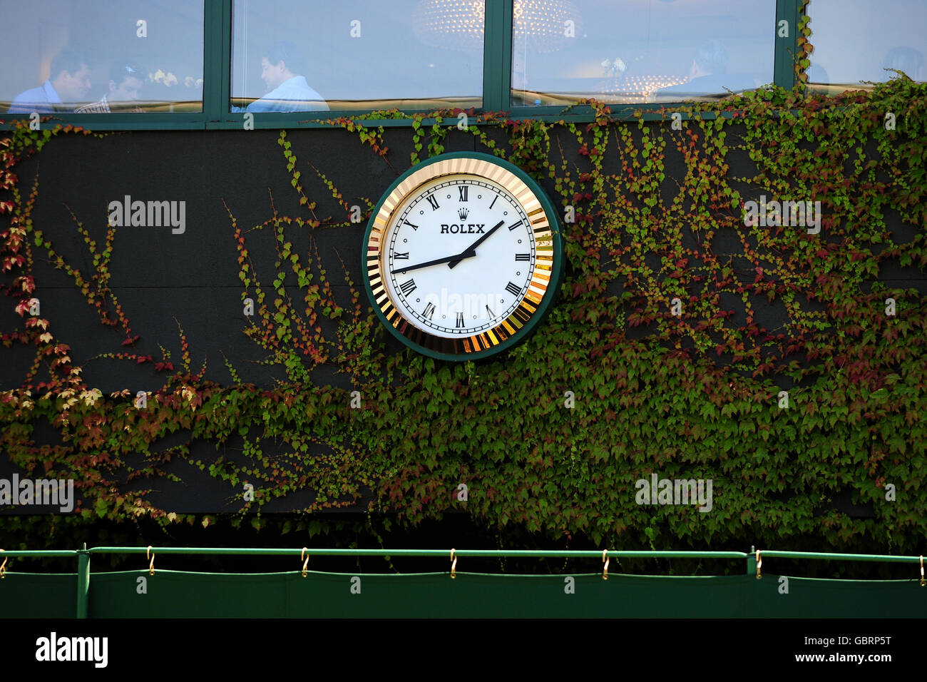 A clock on display at the 2009 Wimbledon Championships at the All ...