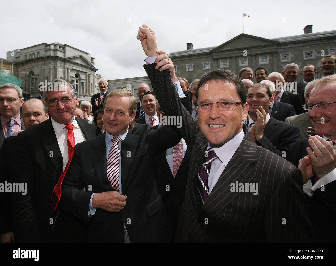 Fine Gael Leader Enda Kenny (centre-left) welcomes Ireland's newest TD ...