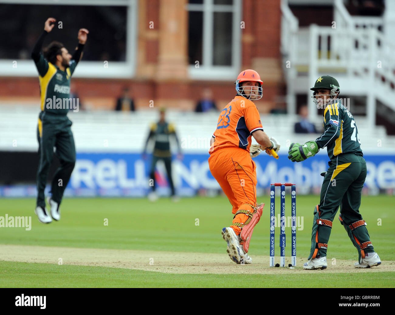 Pakistan's Shahid Afridi (left) celebrates taking the wicket of ...
