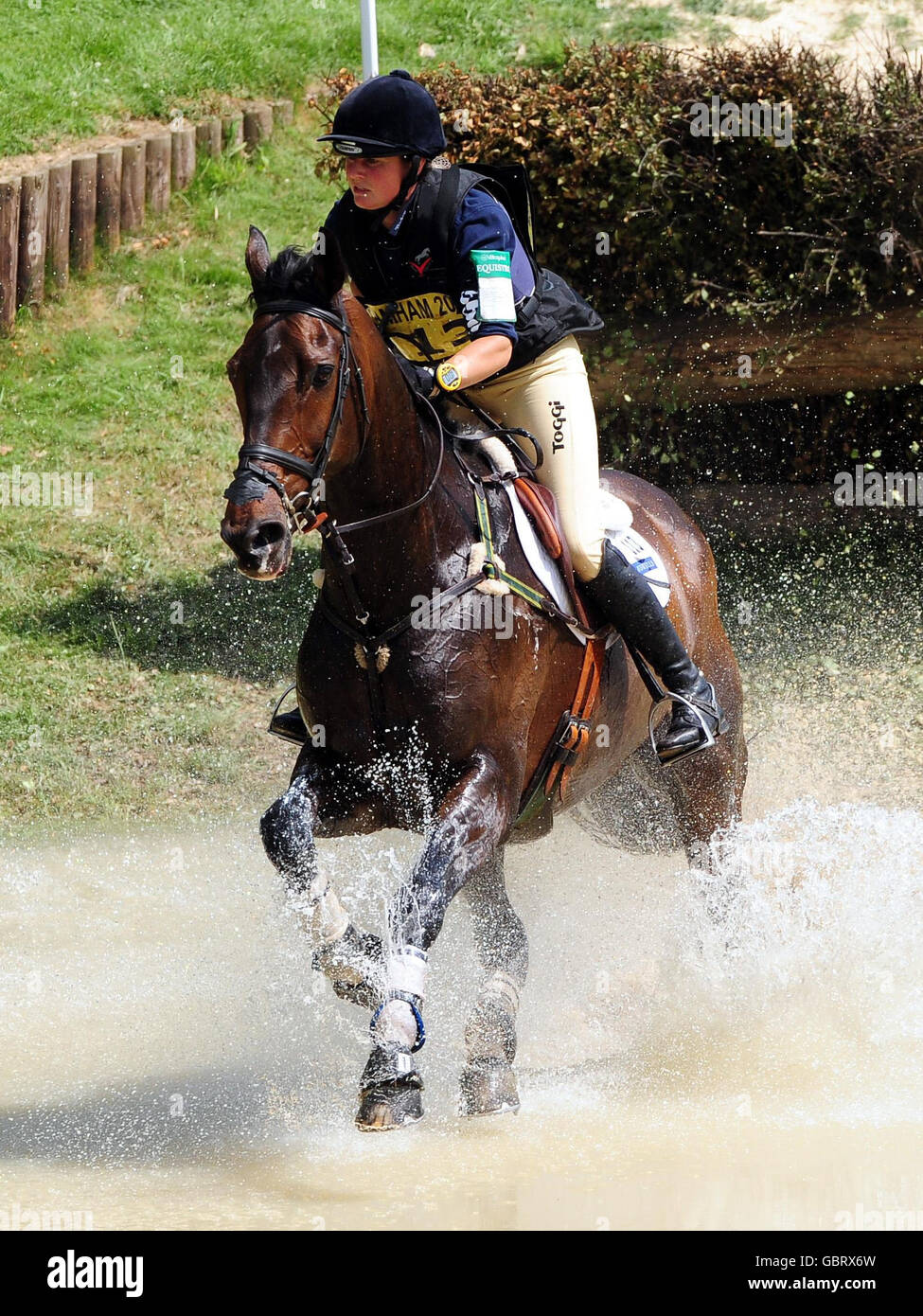 Great Britain's Piggy French riding Some Day Soon at the water jump ...