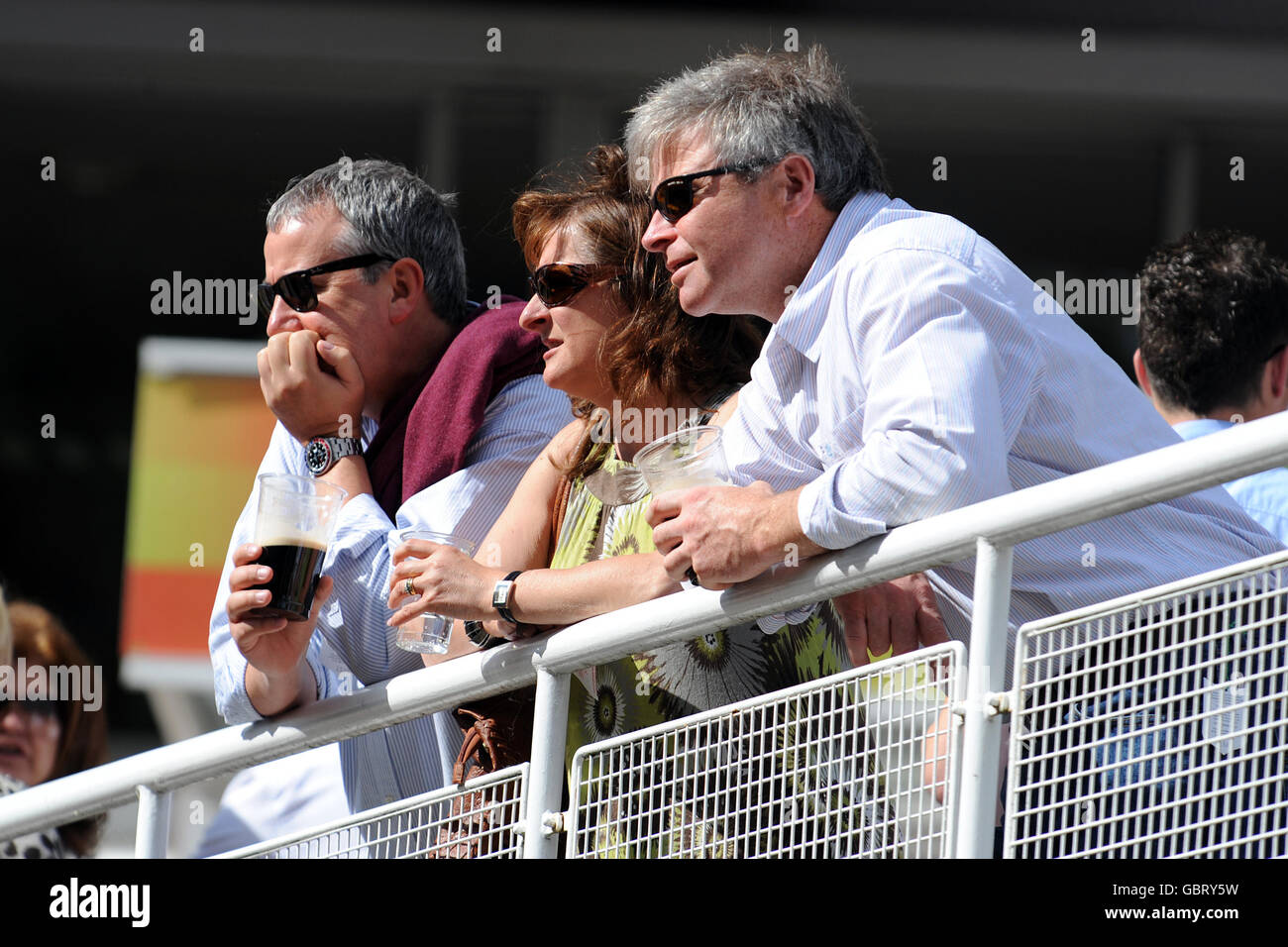 Horse Racing - Totepool Irish Day - Sandown Park. Racegoers enjoy the ...