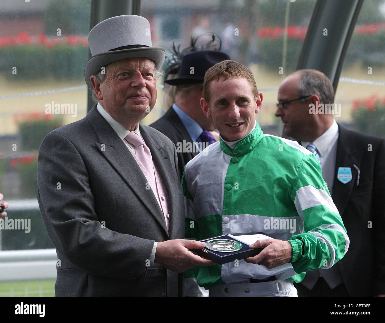 Paul Hanagan is presented with his medal by John Sargeant after winning ...
