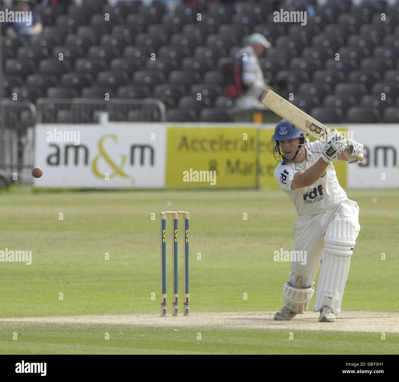 Sussex's Chris Nash hits the ball for four on his way to a century ...