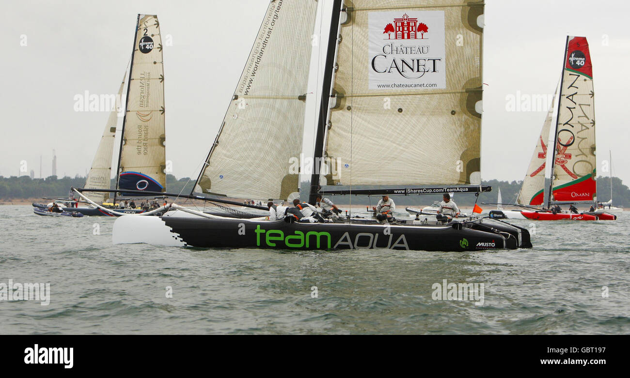 The extreme 40 catamarans of Team Origin (left), Team Aqua (centre) and ...