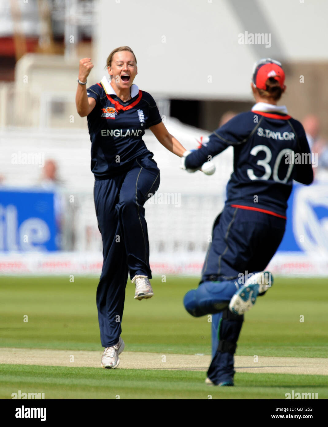 England's Laura Marsh celebrates taking the wicket of New Zealand's ...