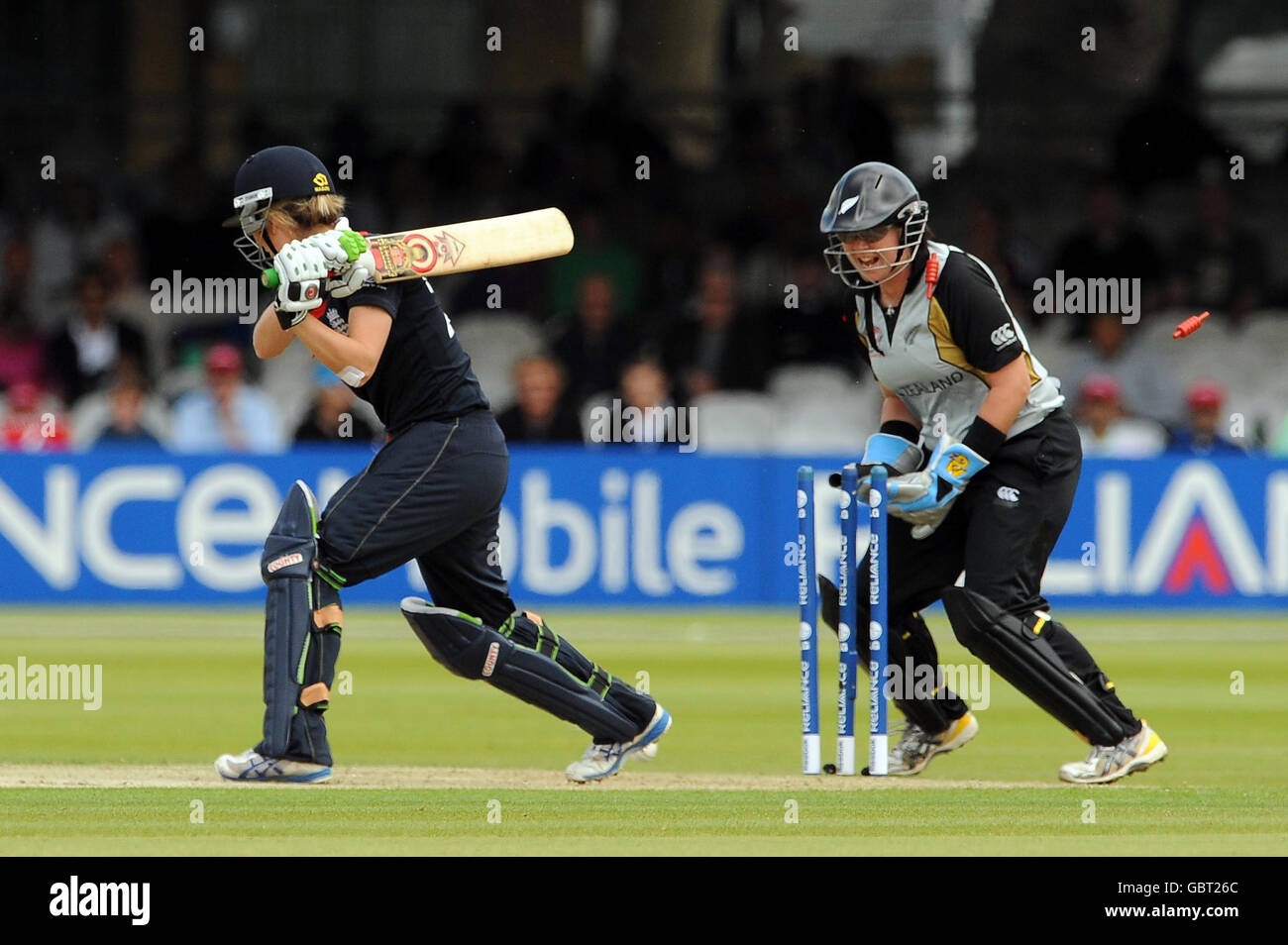 England captain Charlotte Edwards is bowled out by New Zealand's Sian ...