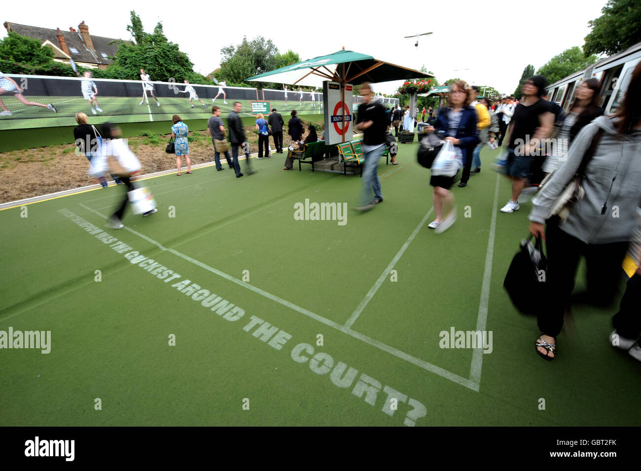 People arrive at Southfields Station, which has a tennis theme for the ...