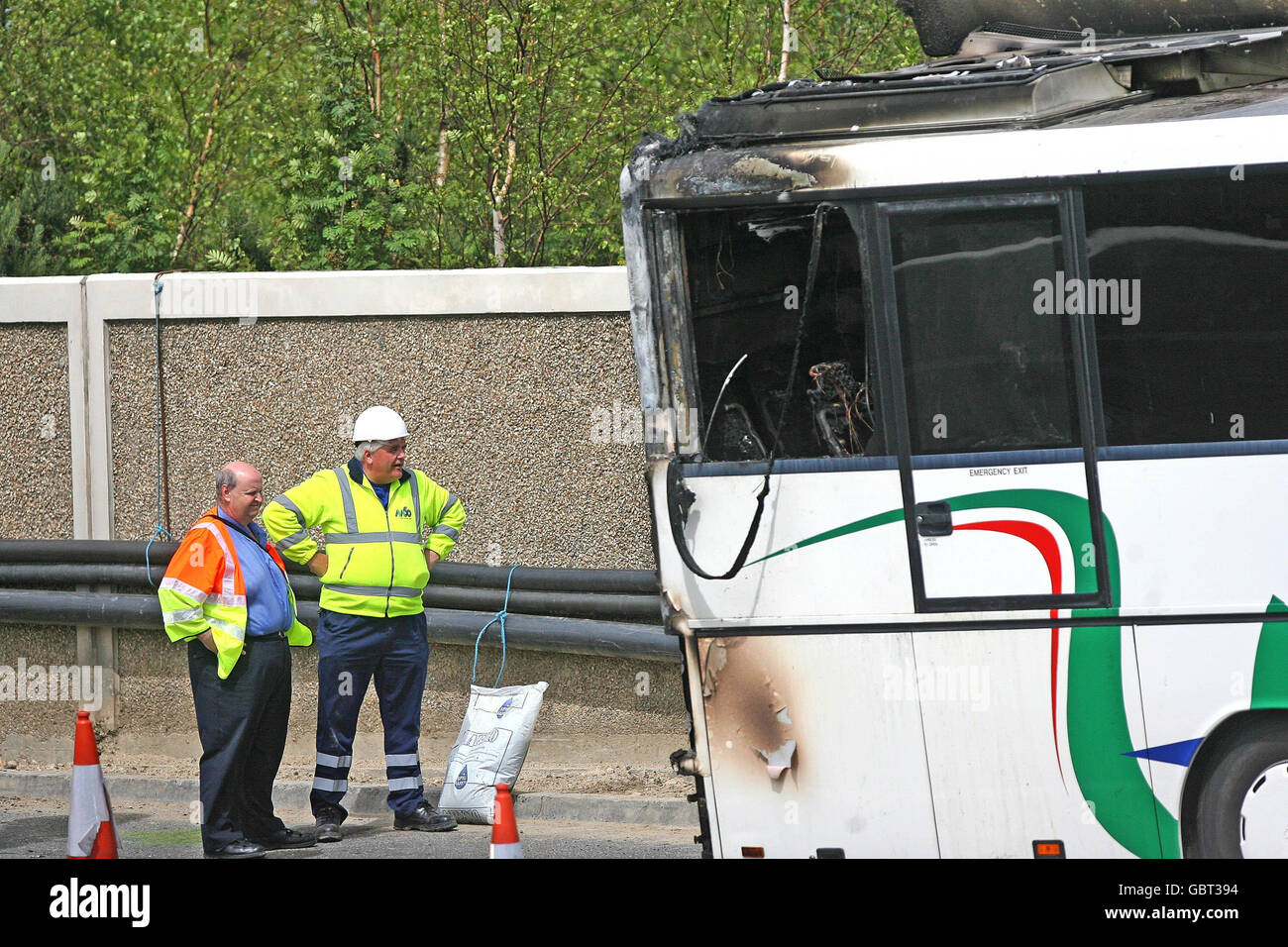 The scene where a bus carrying school children caught fire today on the ...