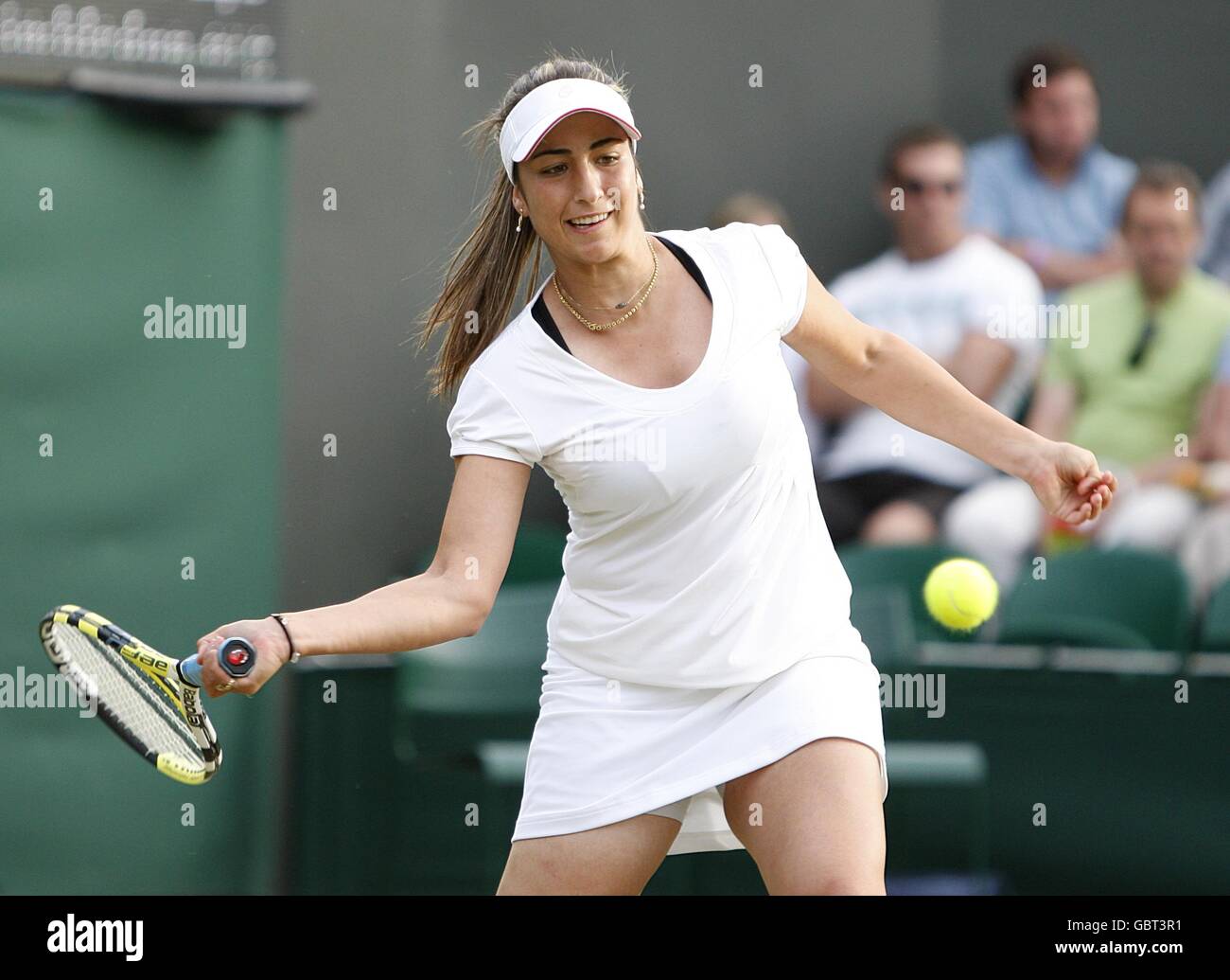 France's Aravane Rezai in action against Russia's Elena Dementieva ...