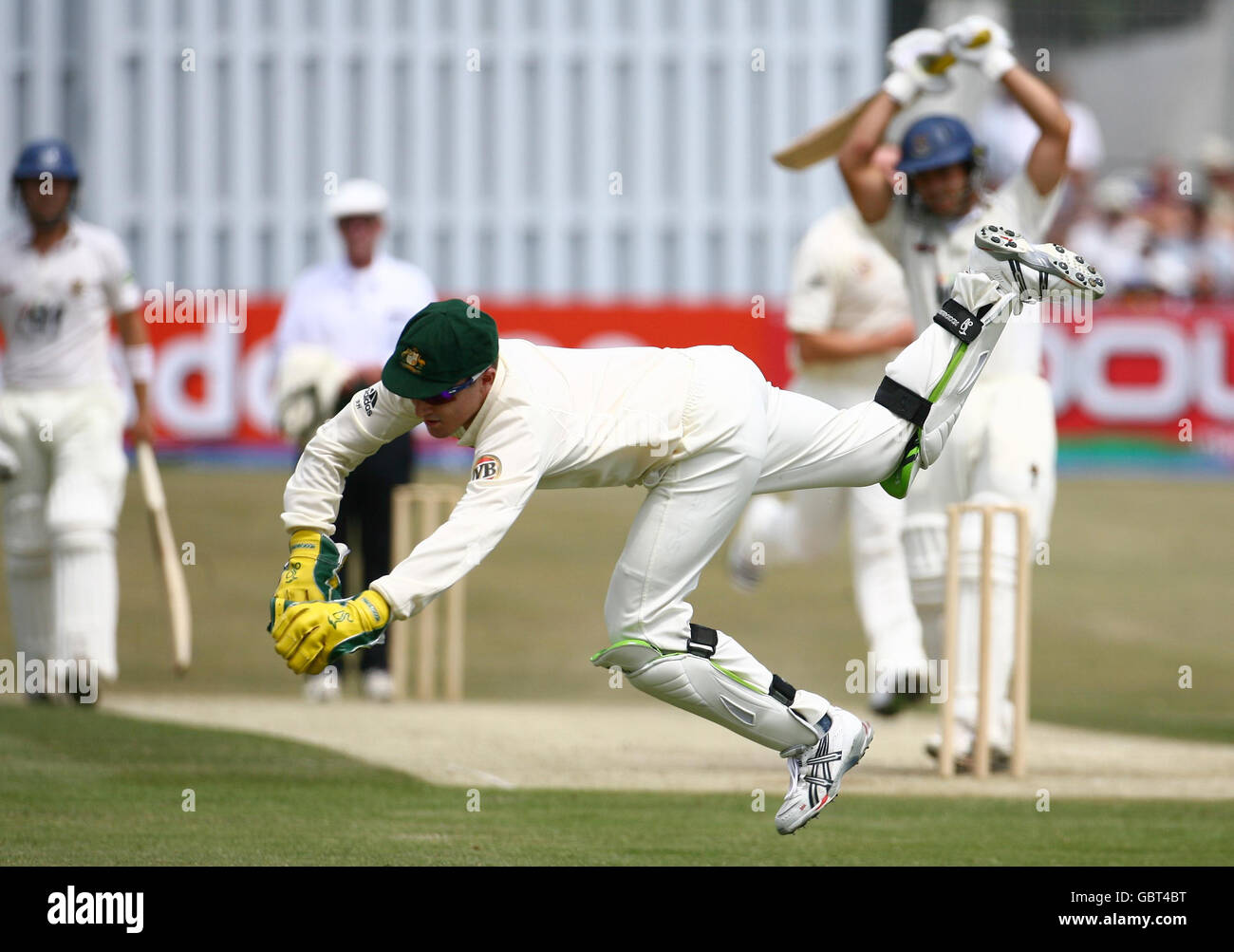 Australian wicket-keeper Brad Haddin dives for a catch during the tour ...