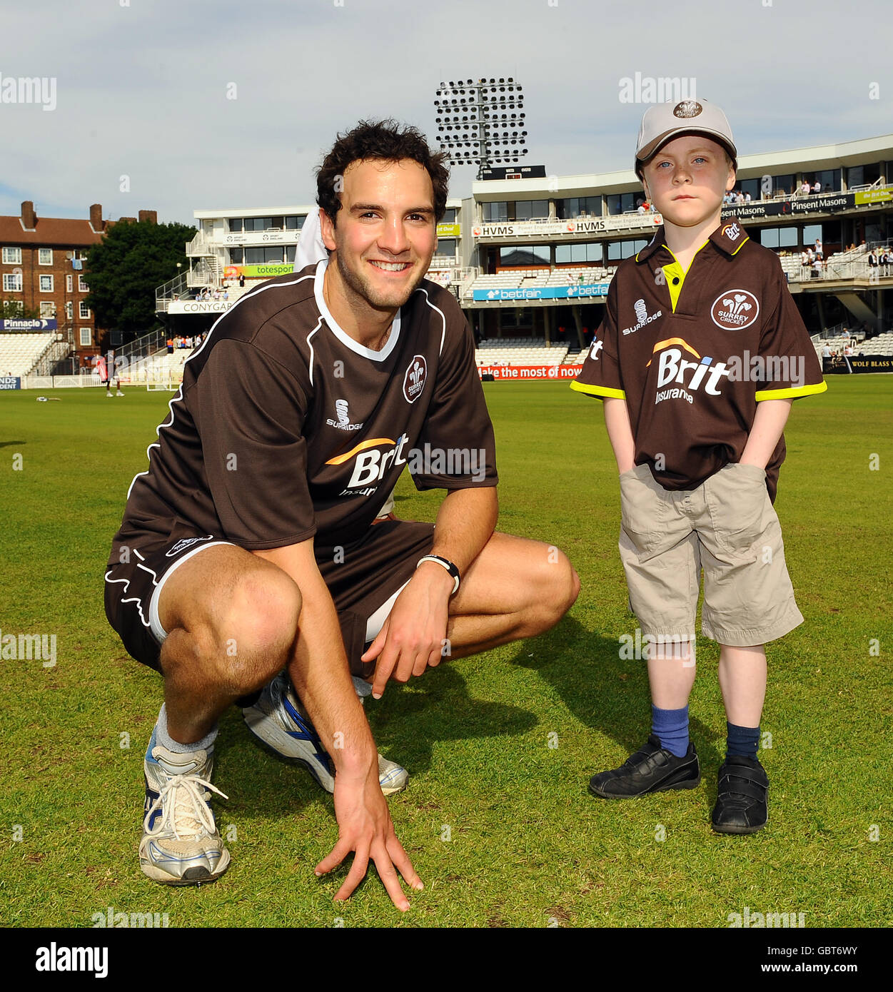 Surrey's Matthew Spriegel (left) poses for a photograph with the day's ...