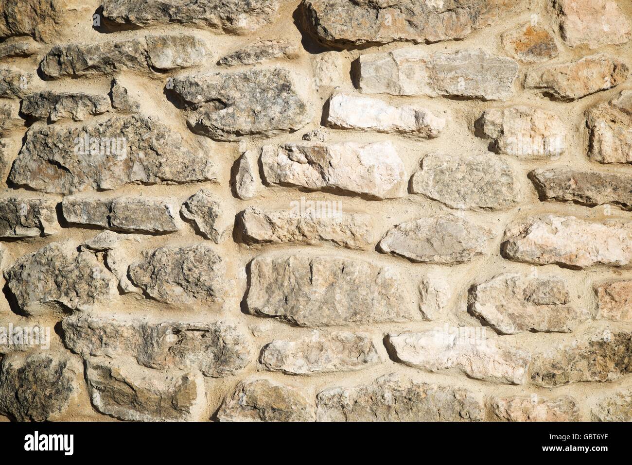 Stone wall background at high resolution Stock Photo - Alamy
