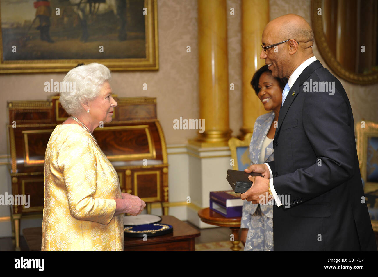 Queen Elizabeth II knights Governor-General of Jamaica Stock Photo - Alamy