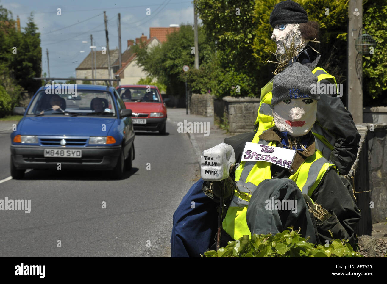 Scarecrow with speed camera hi-res stock photography and images - Alamy