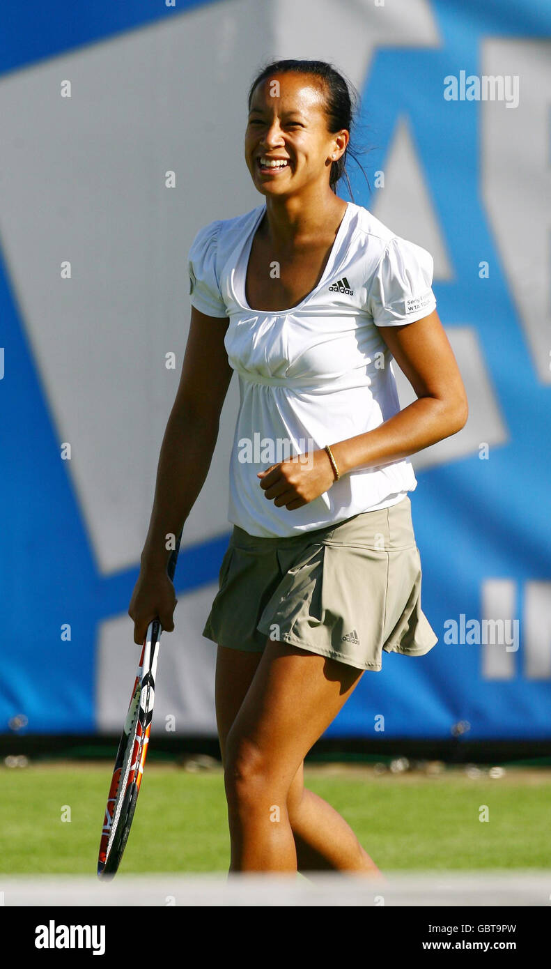 Great Britain's Anne Keothavong smiles in her doubles match during the ...