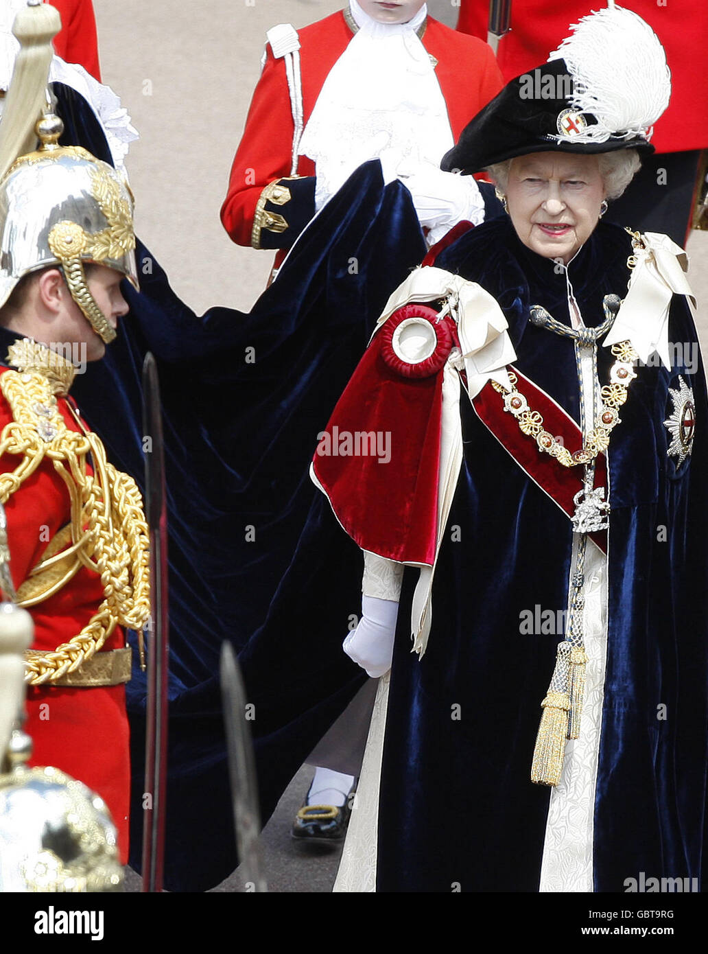 Britain's Queen Elizabeth II processes to attend the Order of The ...