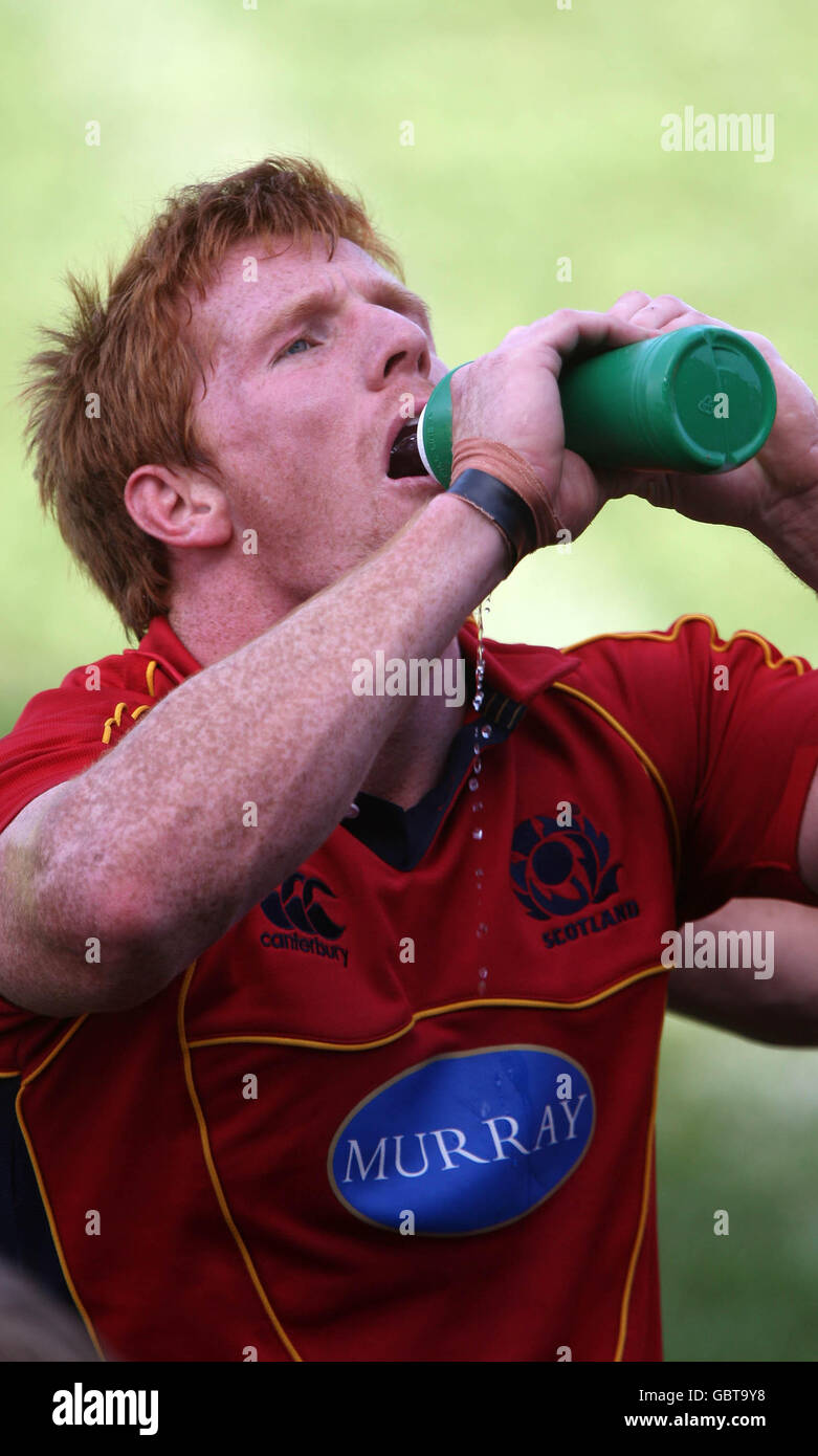 Scotland A's Roddy Grant stops for refreshment during a training ...