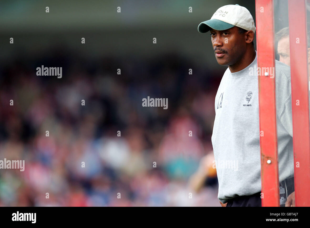 Lincoln City manager Keith Alexander watches the game from the sideline ...
