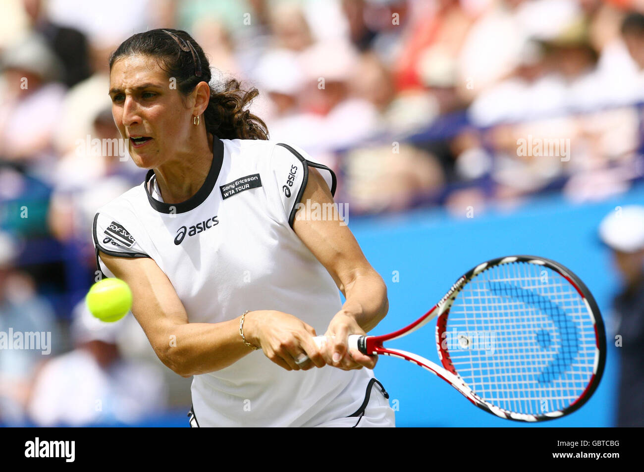 France's Virginie Razzano in action during her semi-final match against ...
