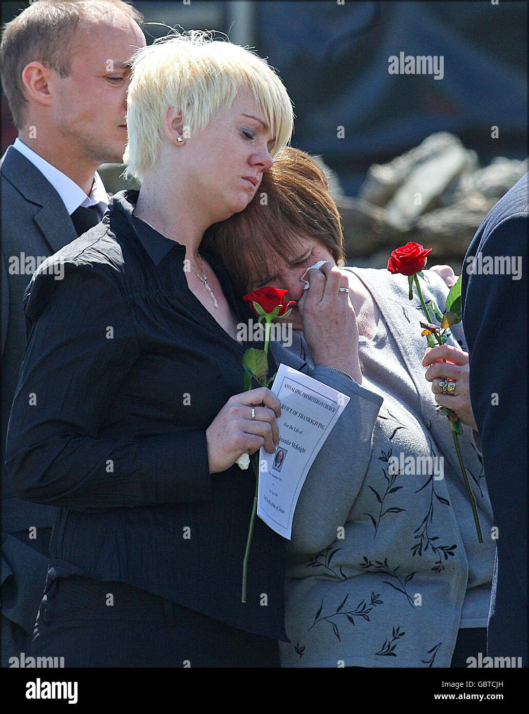 Mourners attend the funeral of Pilot and retired Police Officer Hugh ...