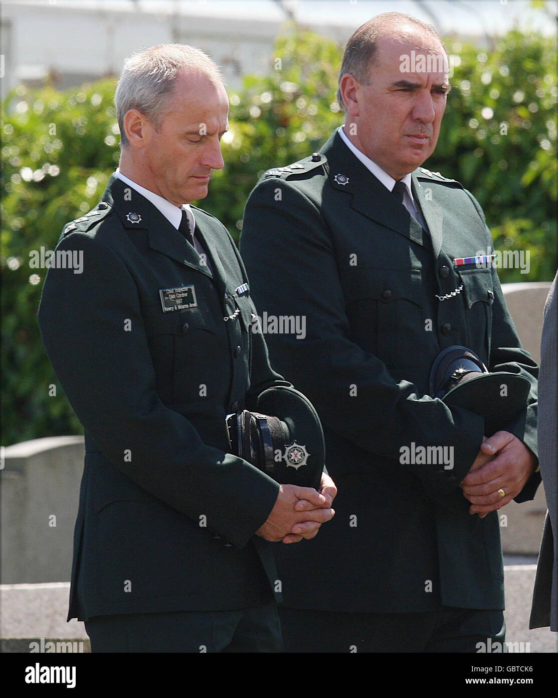 PSNI Members joining mourners during the funeral of Pilot and retired ...