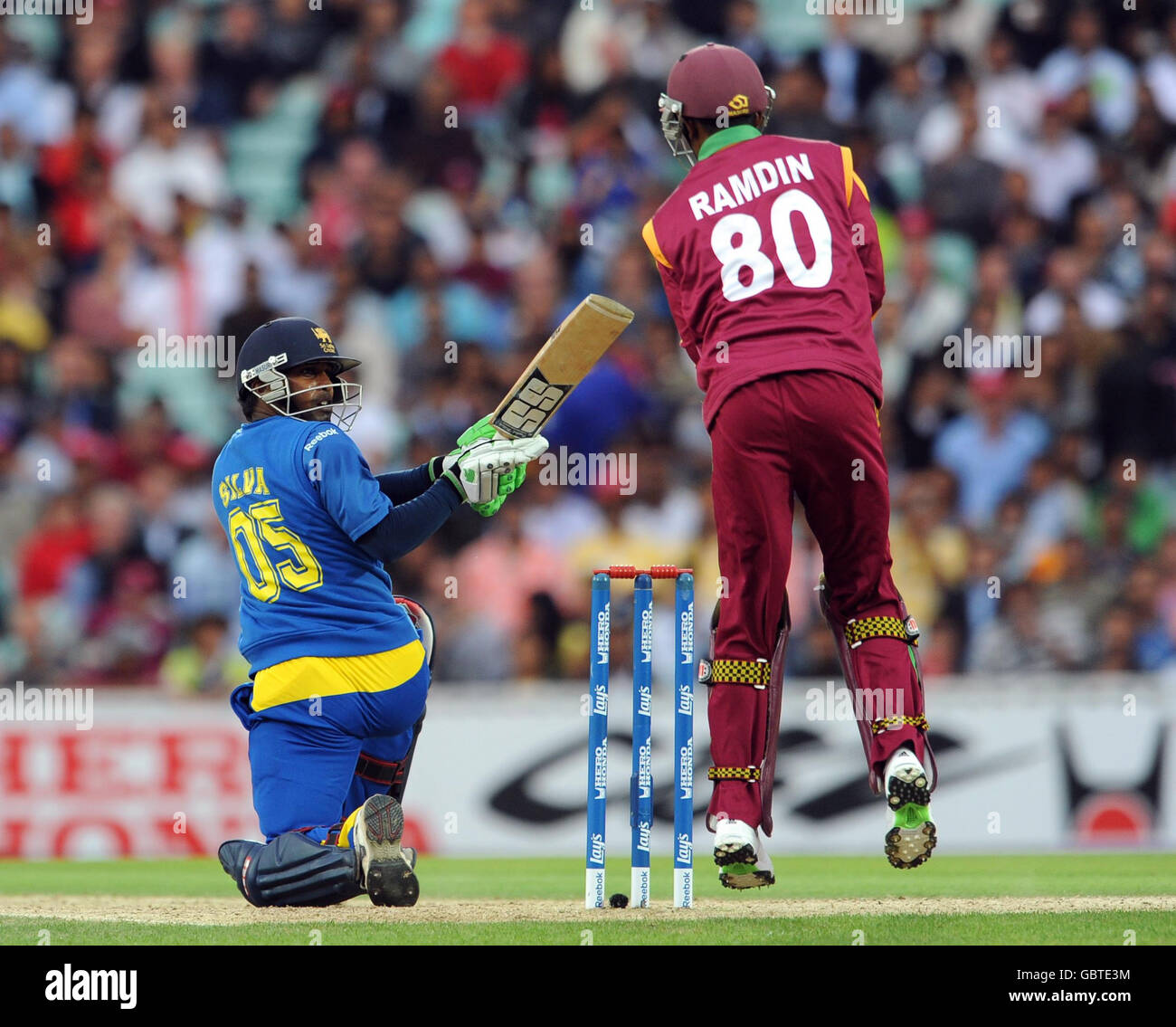 Sri Lanka's Chamara Silva is caught behind by Denesh Ramdin during the ...