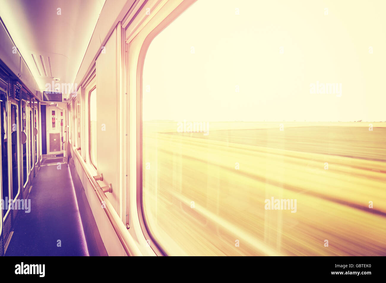 Vintage toned train window frame with motion blurred view, space for ...